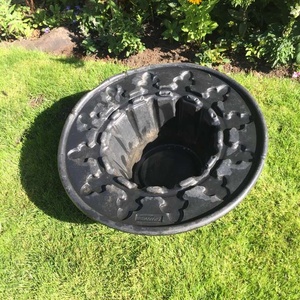 FreelyWheely: Pre formed plastic pond.