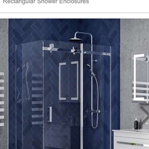 FreelyWheely: New Nova 1000 x 700 shower enclosure and Aurora shower tray.