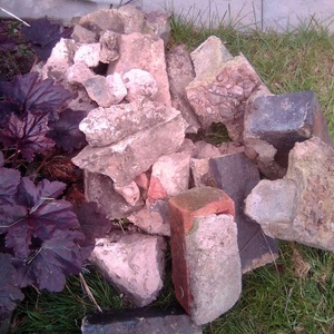 FreelyWheely: Rubble/broken reinforced concrete fence post and broken ...