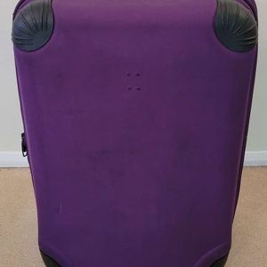 FreelyWheely: Large 4-wheeled Expandable Suitcase in Dark Purple