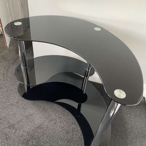 FreelyWheely: Three tiers black glass computer desk
