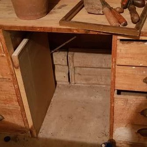 FreelyWheely: Old desk style drawers work bench table.