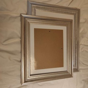 FreelyWheely: Two silver ornate detail wooden frames