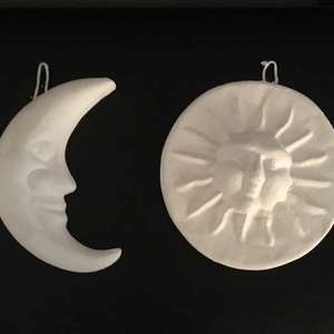 FreelyWheely: Sun and moon plaster casts