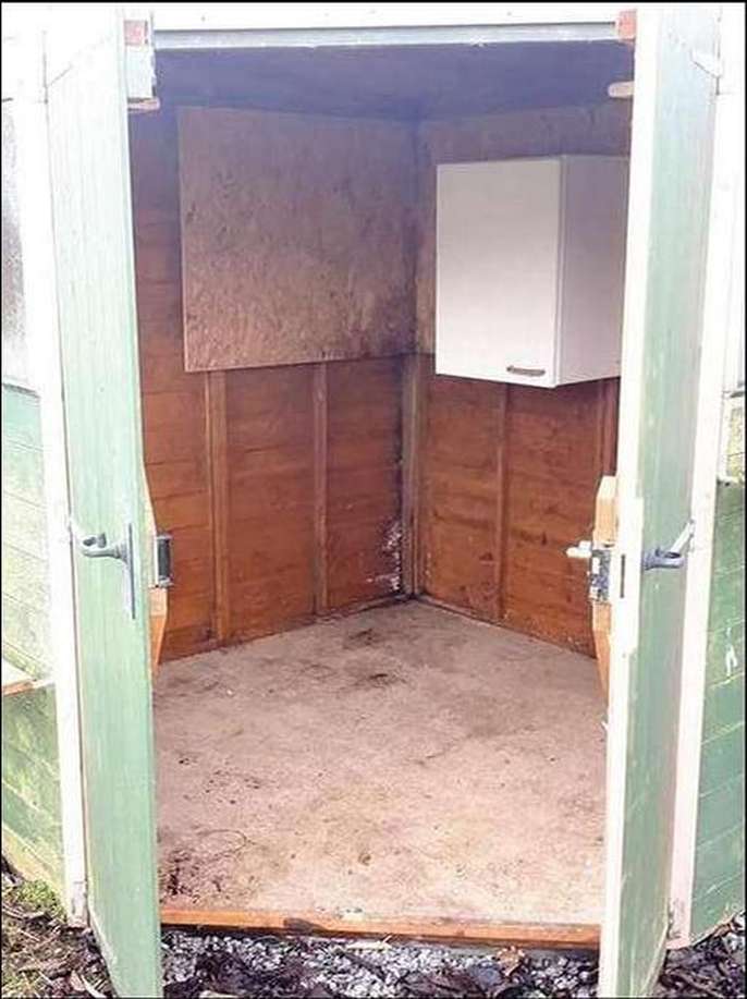 FreelyWheely: Timber corner shed with lock and key