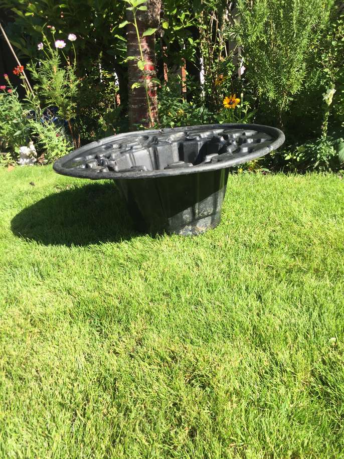 FreelyWheely: Pre formed plastic pond.