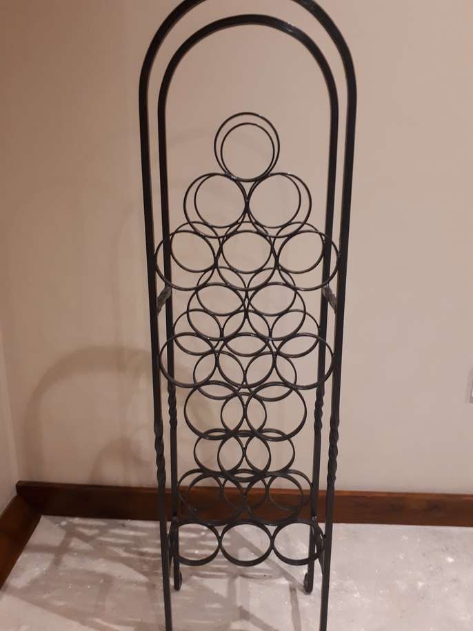 FreelyWheely: Decorative Black Metal Wine Rack