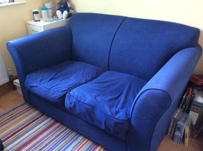 FreelyWheely: Small blue sofa