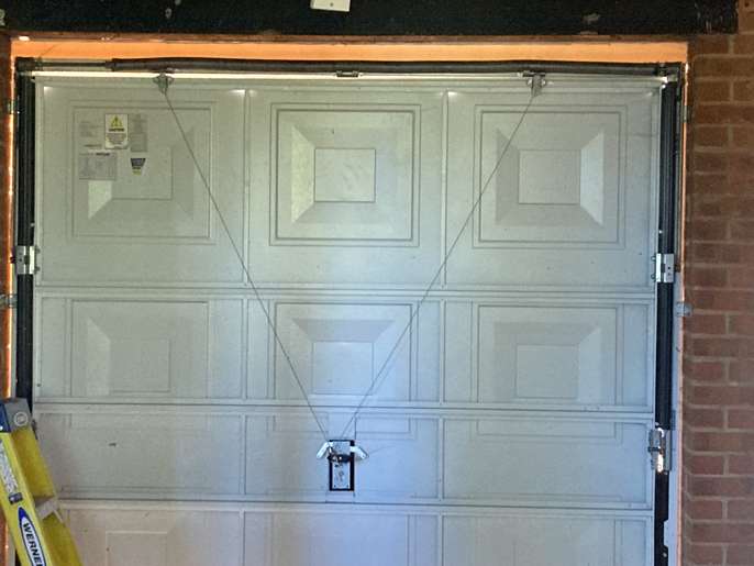 FreelyWheely: Single metal up and over door with key