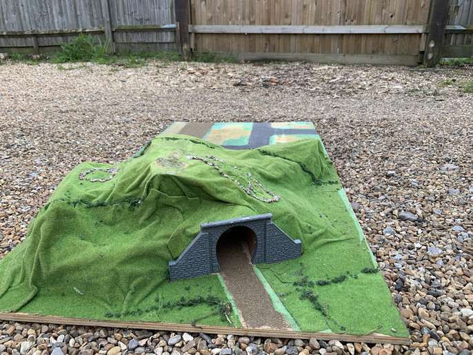 FreelyWheely: Model train tunnel with base