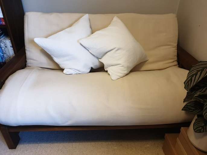 FreelyWheely: Beautiful futon with cream linen cover and solid wooden frame