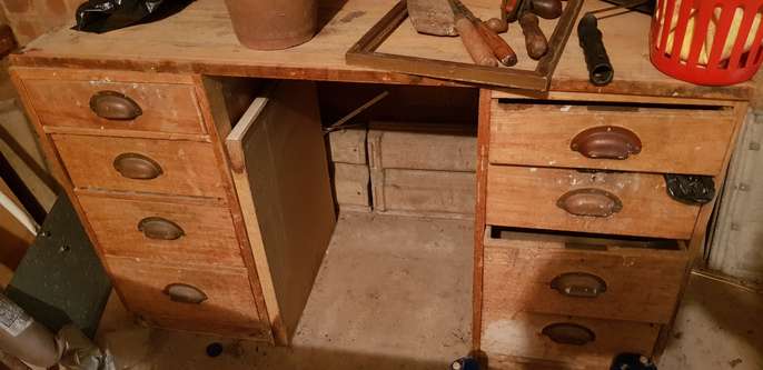 FreelyWheely: Old desk style drawers work bench table.