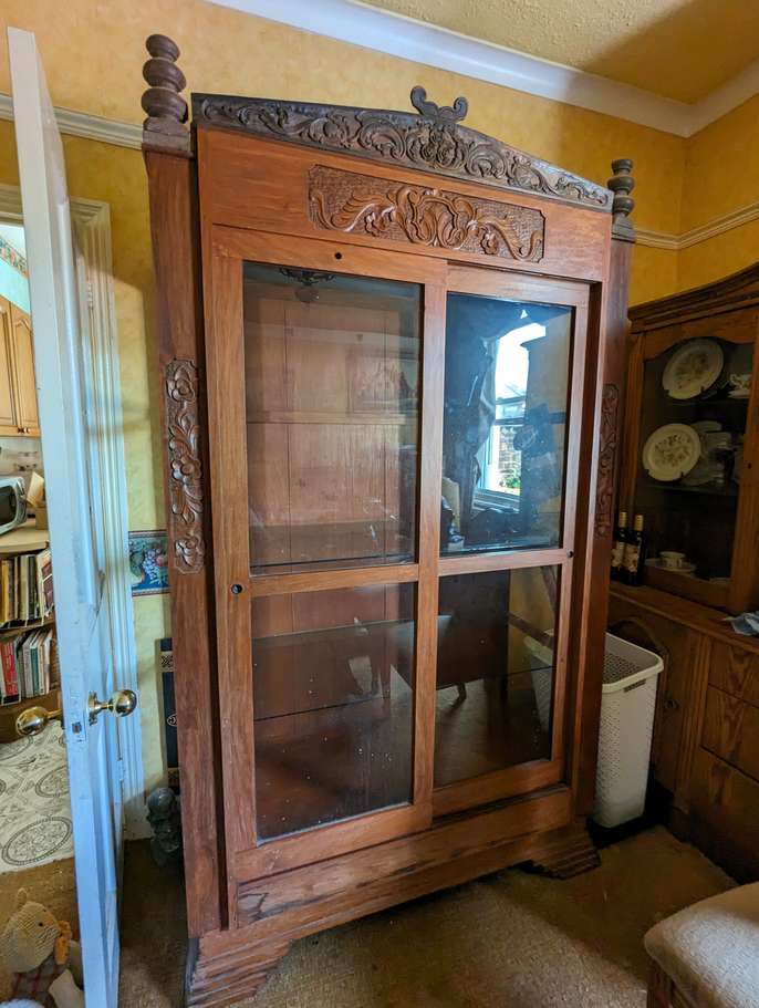FreelyWheely: Large display cabinet. Solid wood, hand carved.