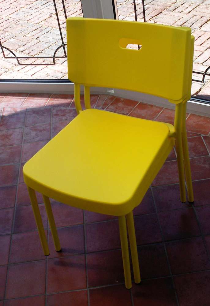FreelyWheely: 2 Brand New Bright Yellow Chairs