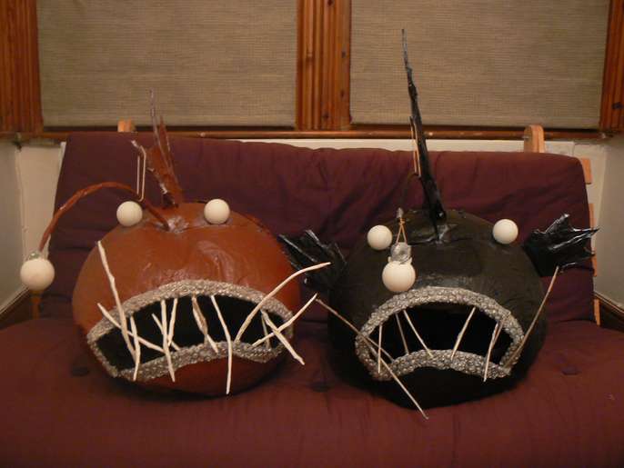FreelyWheely: A pair of paper mache angler fish costumes