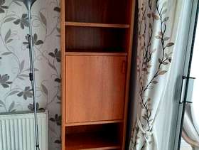 FreelyWheely: Bookcase with cupboard below.